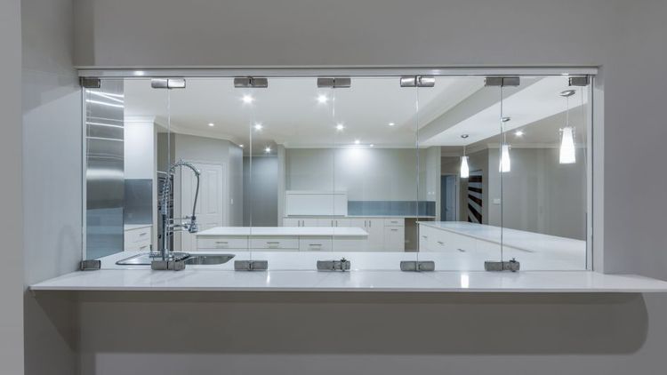 Frameless bi-folds from JH Glass Innovation | ArchitectureAu