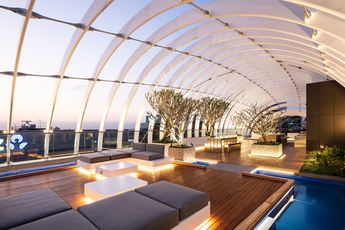 Koichi Takada Architects completes arched towers in central Sydney ...