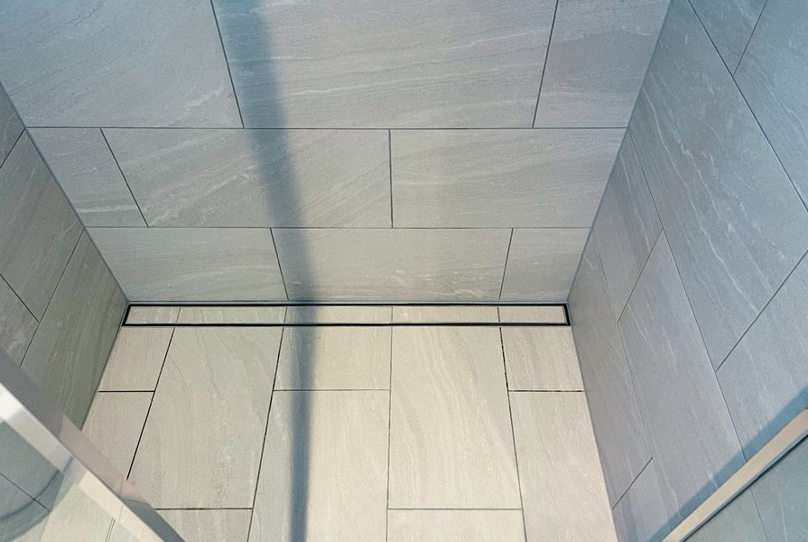 Wall-to-wall shower channels specified for Victoria & Vine | ArchitectureAu