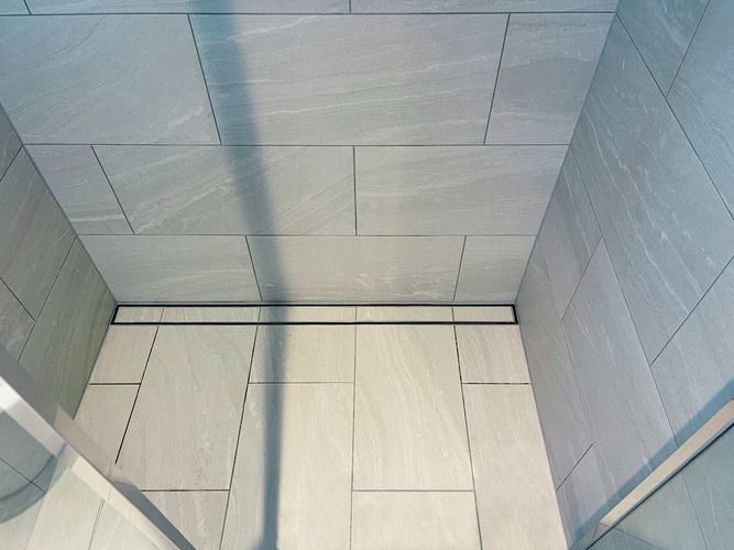 Wall-to-wall shower channels specified for Victoria & Vine | ArchitectureAu